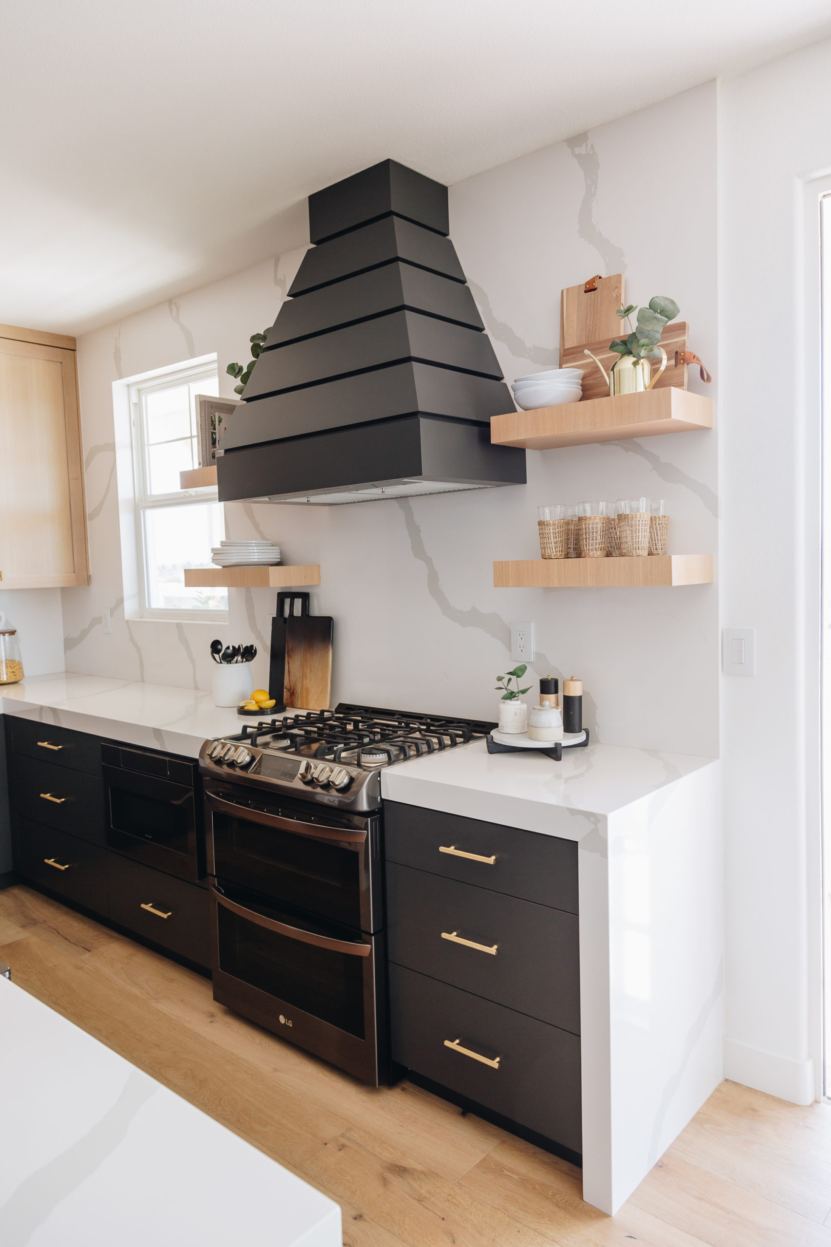 How To Style Floating Shelves Like a Designer - rebeccarollinsinteriors.com